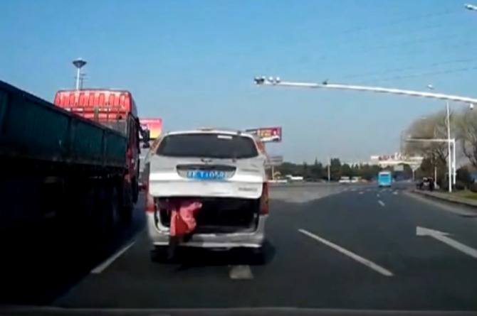 Scary Video Shows Toddler Falling Out Of Van On Busy Highway