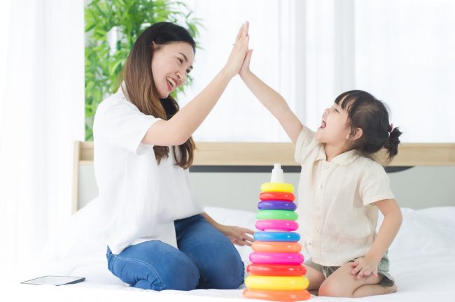 Here’s Why You Should Give Your Kids More High Fives
