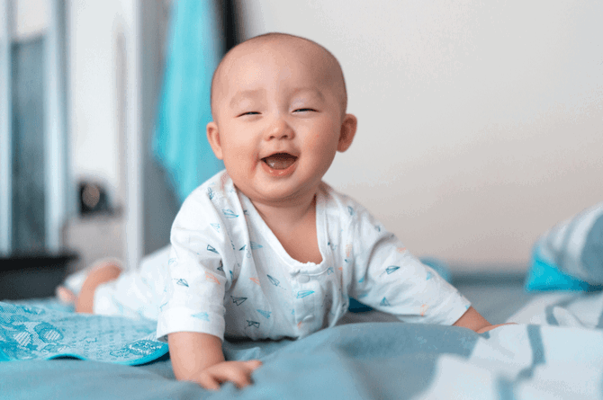 15 Easy Ways To Get Your Little One Laughing Like There's No Tomorrow