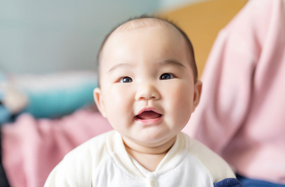 4 Month Old Baby: A Development And Milestones Guide